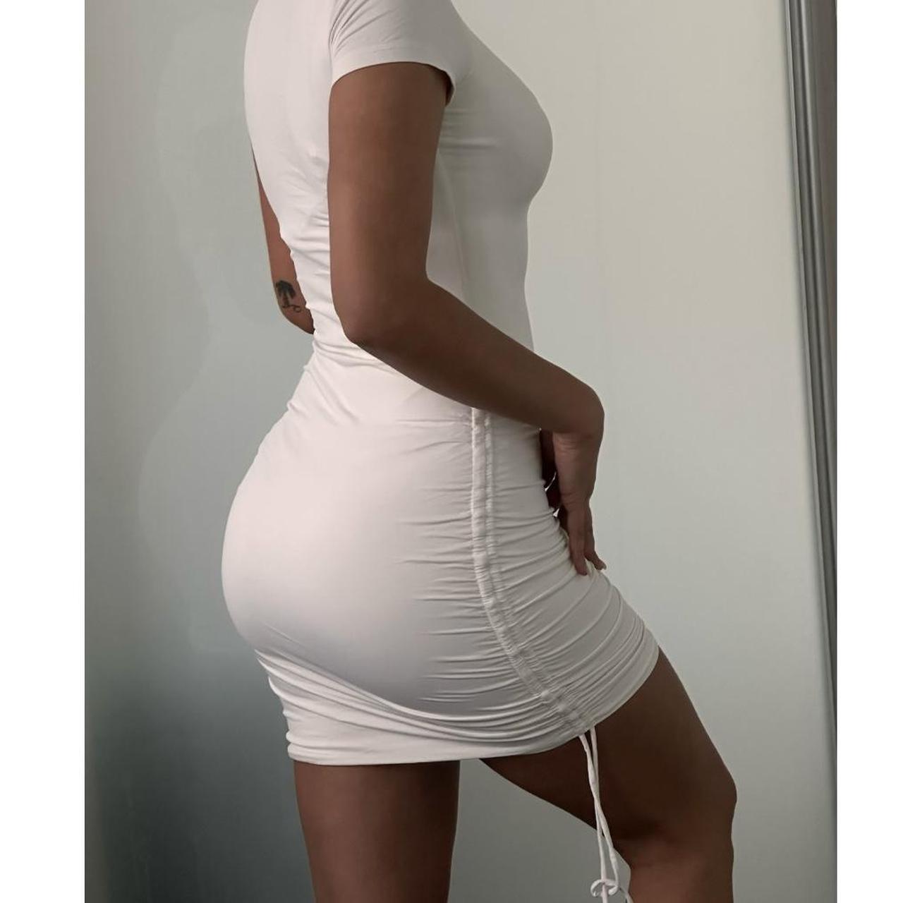 White body com dress from Meshki, material is really... - Depop