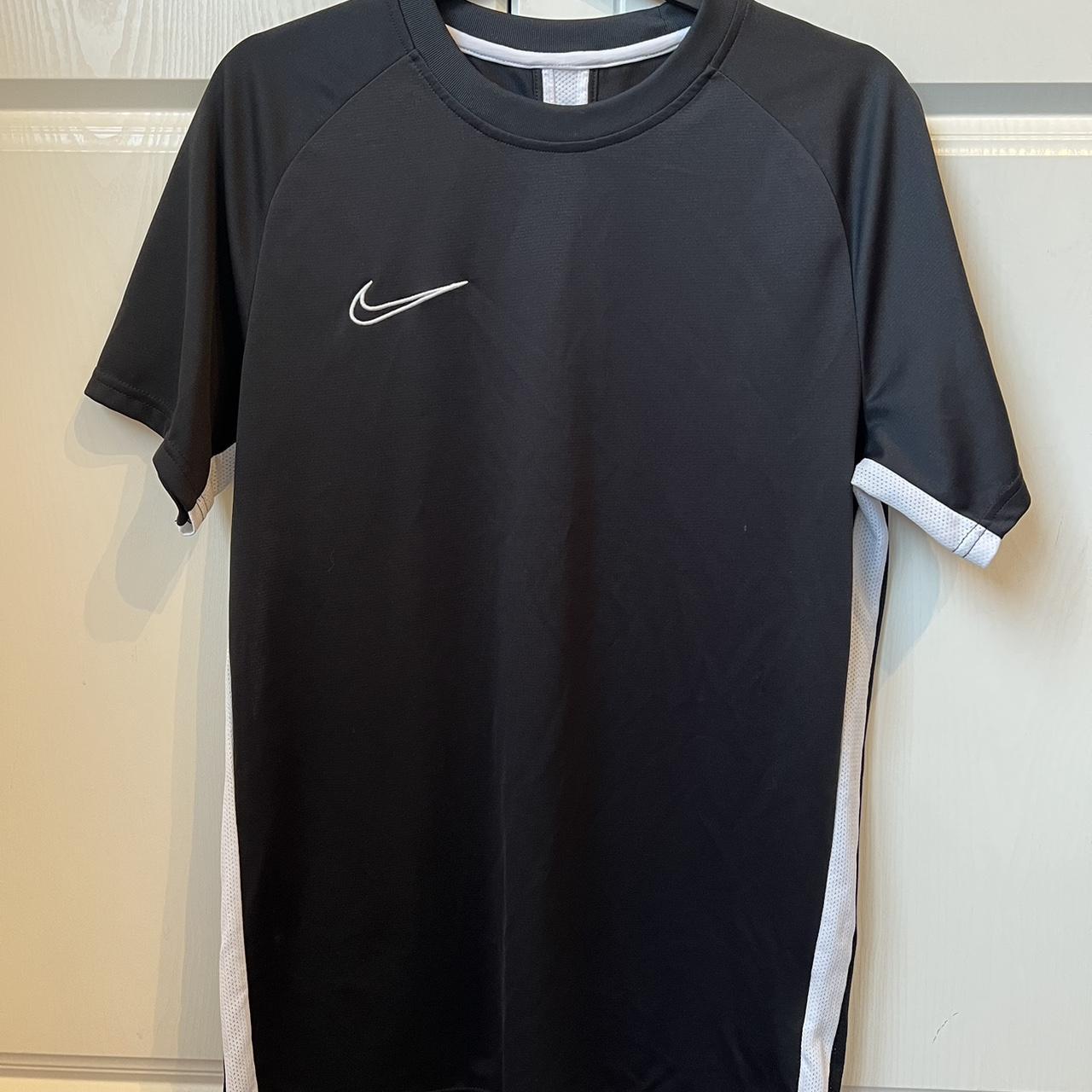 Men’s Nike black dry fit top Size M Good condition - Depop