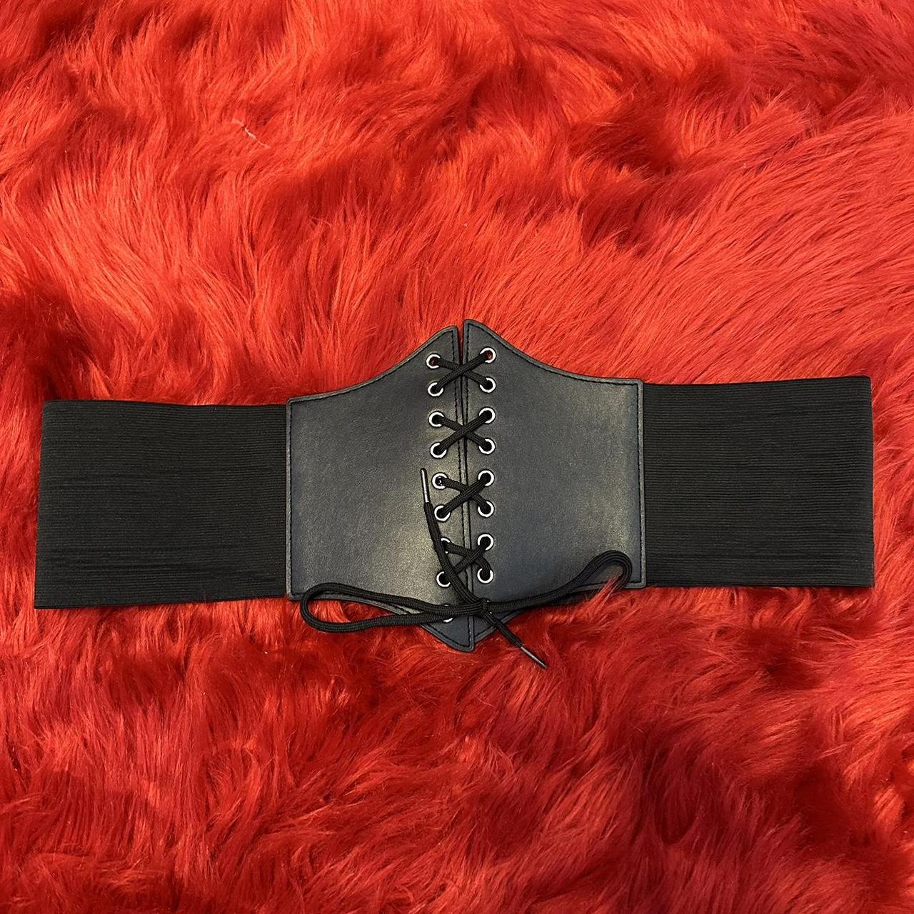 elastic corset with snap closure would fit a size... - Depop