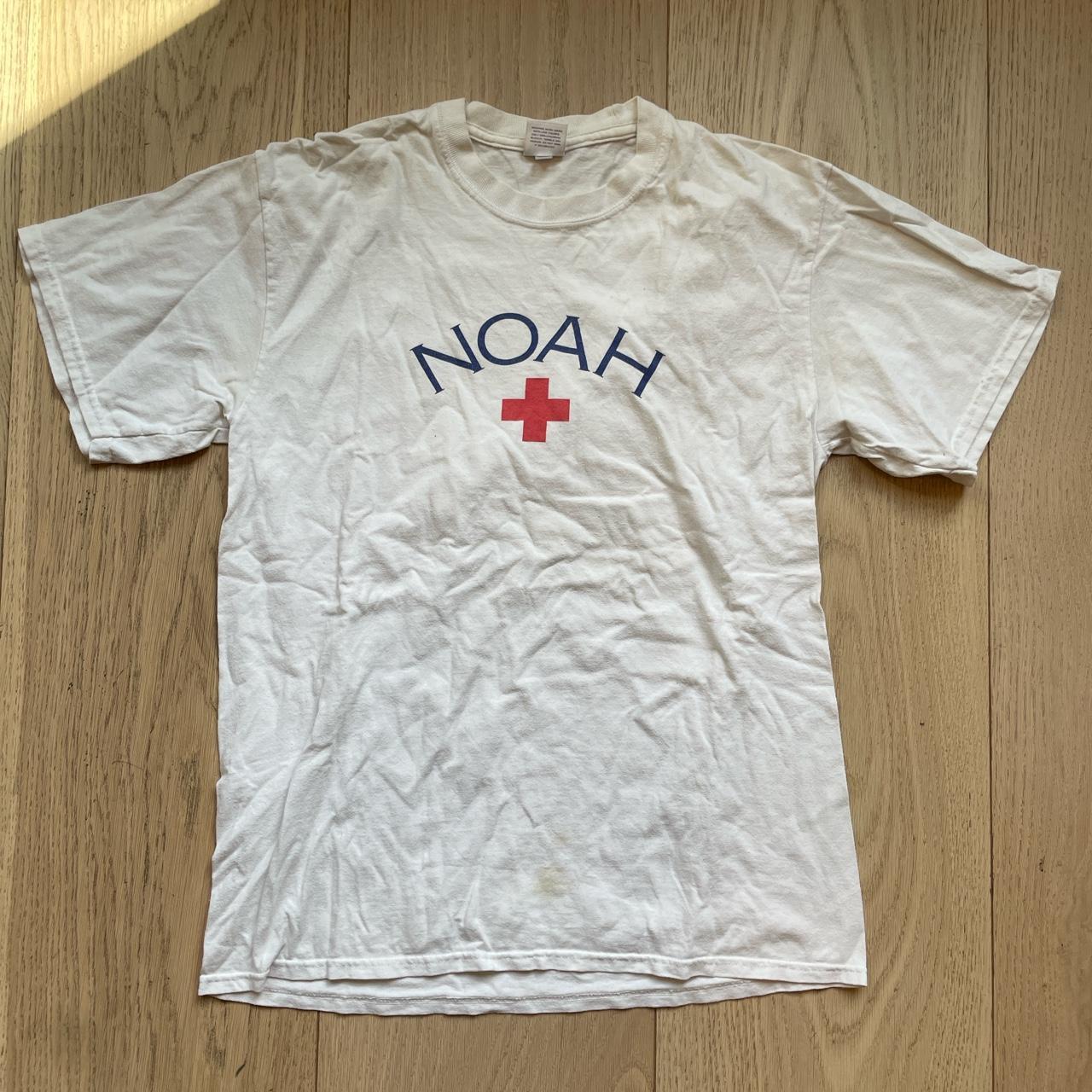 Noah Red Cross t shirt Small stain pictured in... - Depop