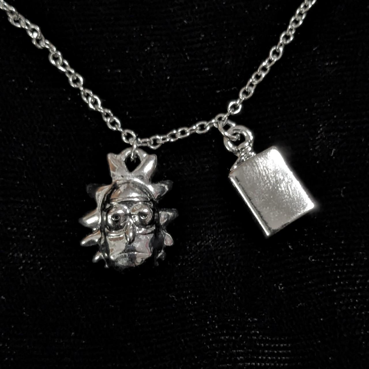 rick and morty silver chain necklace has rick... - Depop