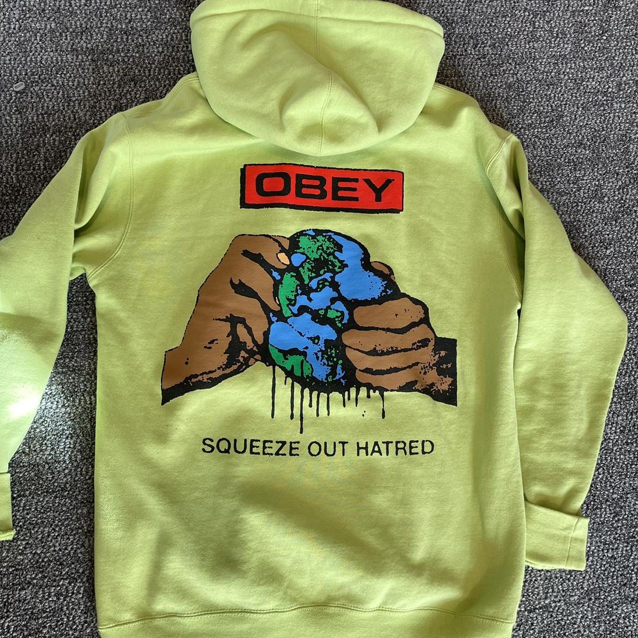 Obey graphic hoodie ‘squeeze out hatred’ Size... - Depop
