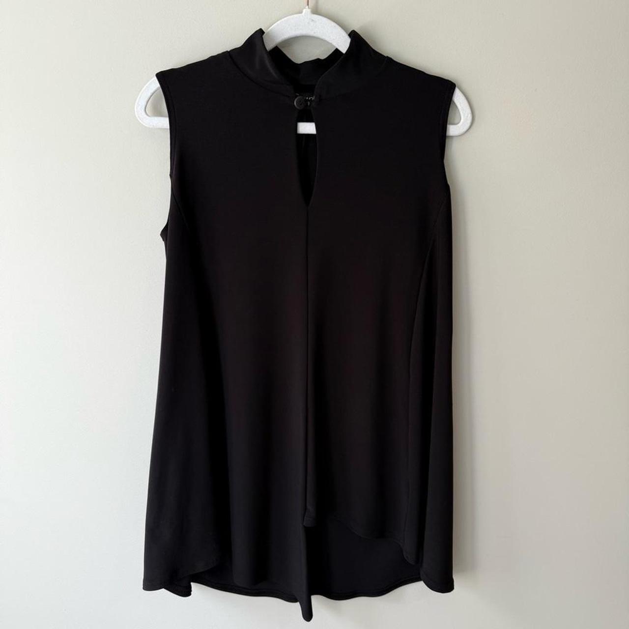 The Sympli Black Blouse features a relaxed,... | Depop