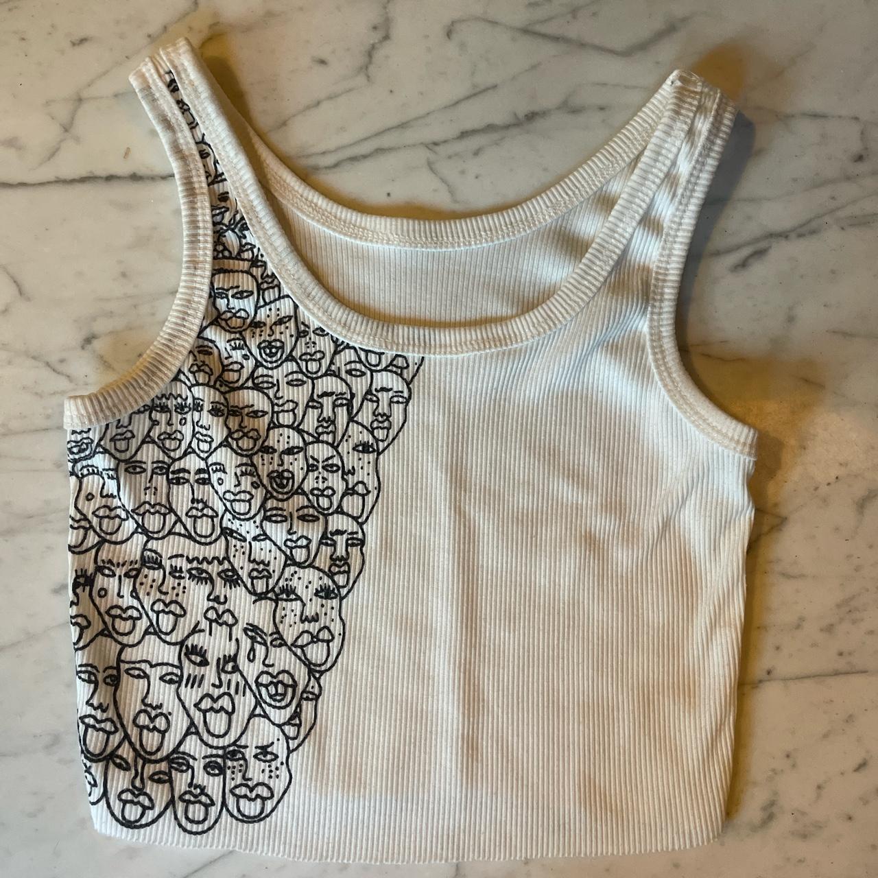 Cute little crop top with faces graphic. Nice ribbed... - Depop