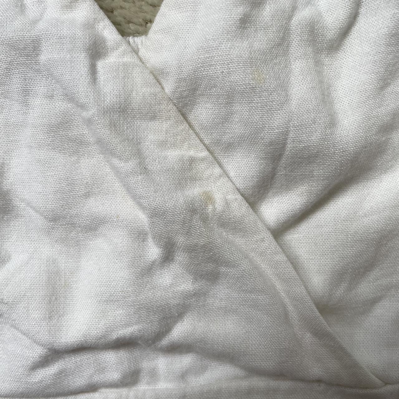 Brandy Melville white cross over tank top. Good... - Depop