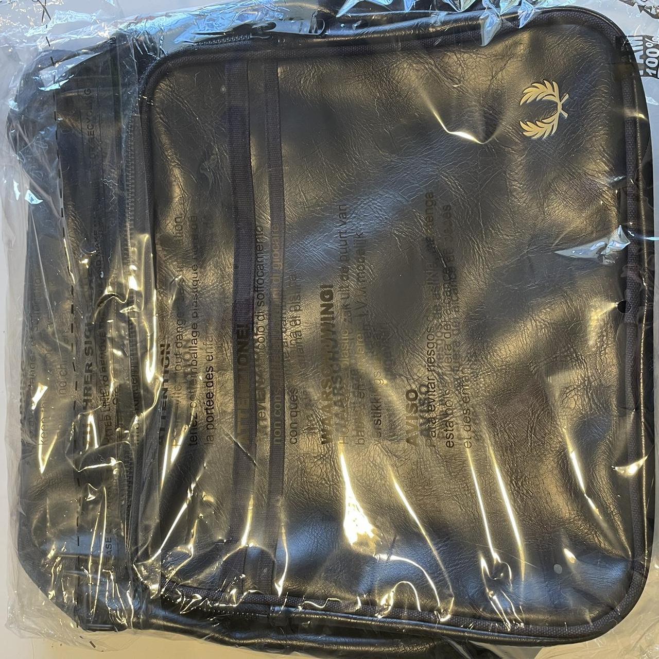 Navy Fred Perry bag. Brand new with tag in sealed... - Depop