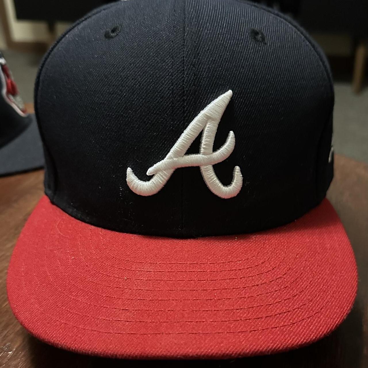New era fitted navy and red Atlanta Braves hat Size:... - Depop
