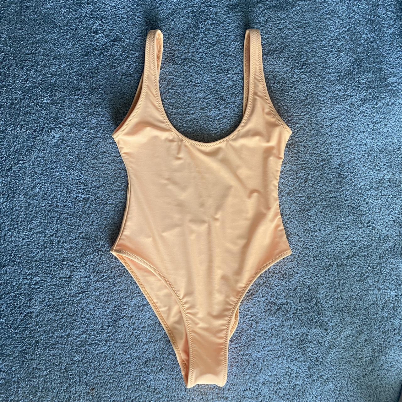 White fox one piece swimsuit with a low back. Never... - Depop