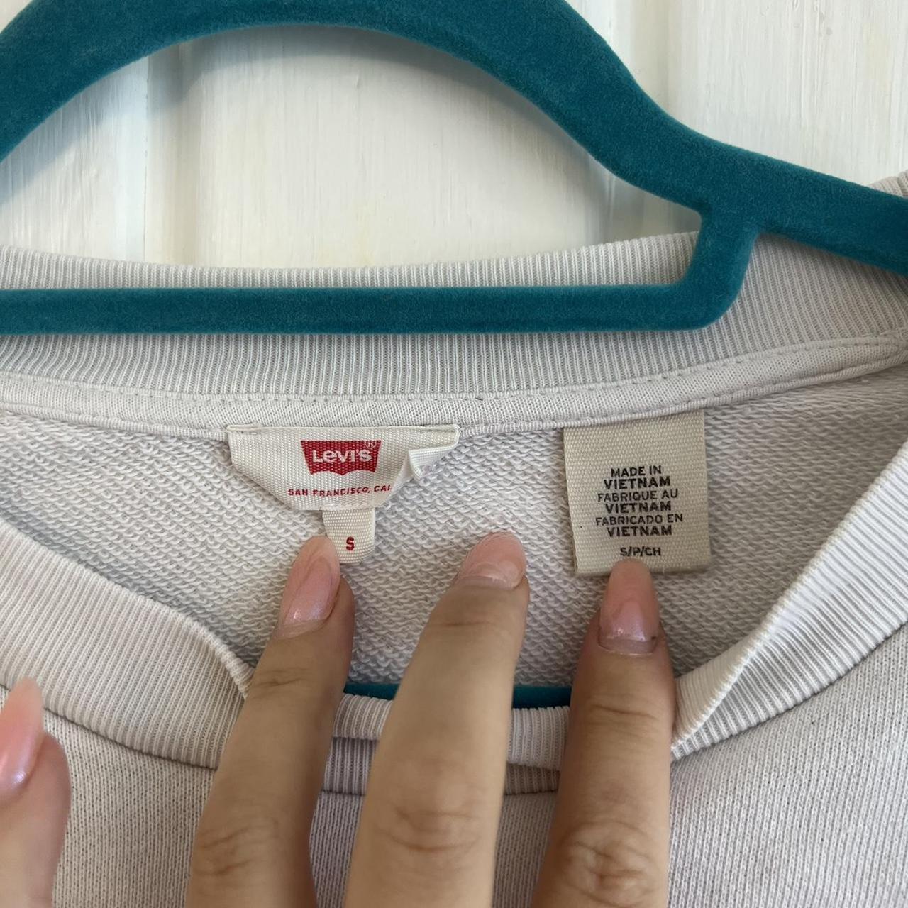 Levi’s white jumper with red and pink design Size... - Depop