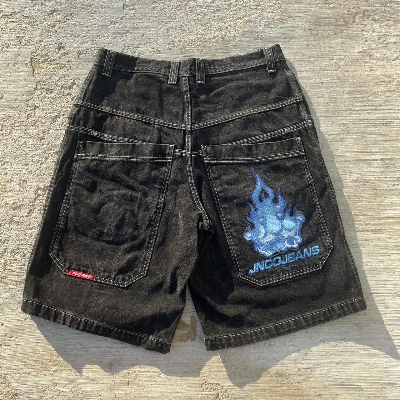 Mens vintage jnco jeans jorts blue fire crown, in... - Depop