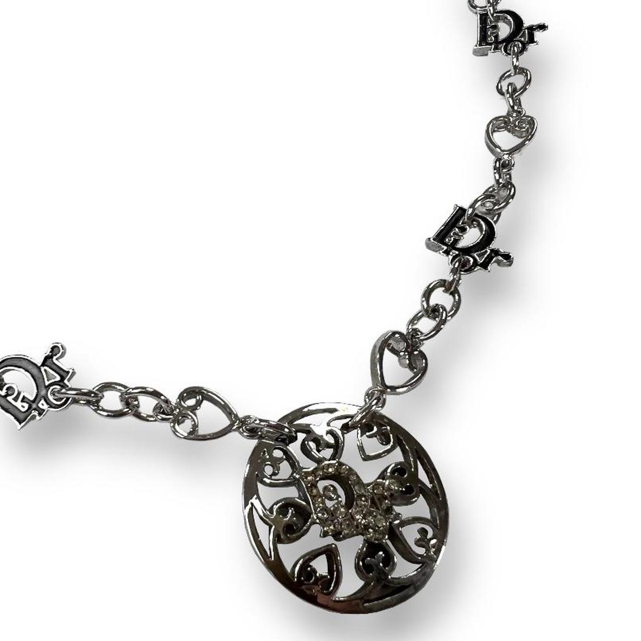 Dior necklace in silver tone with iconic Dior... - Depop