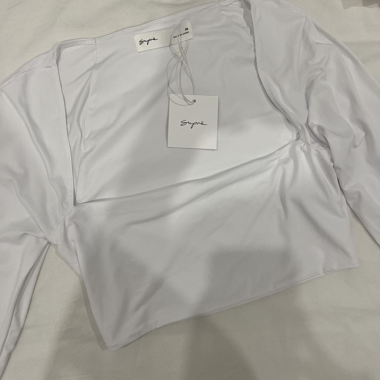 Black & white Supré luxe long sleeve crop tops... - Depop