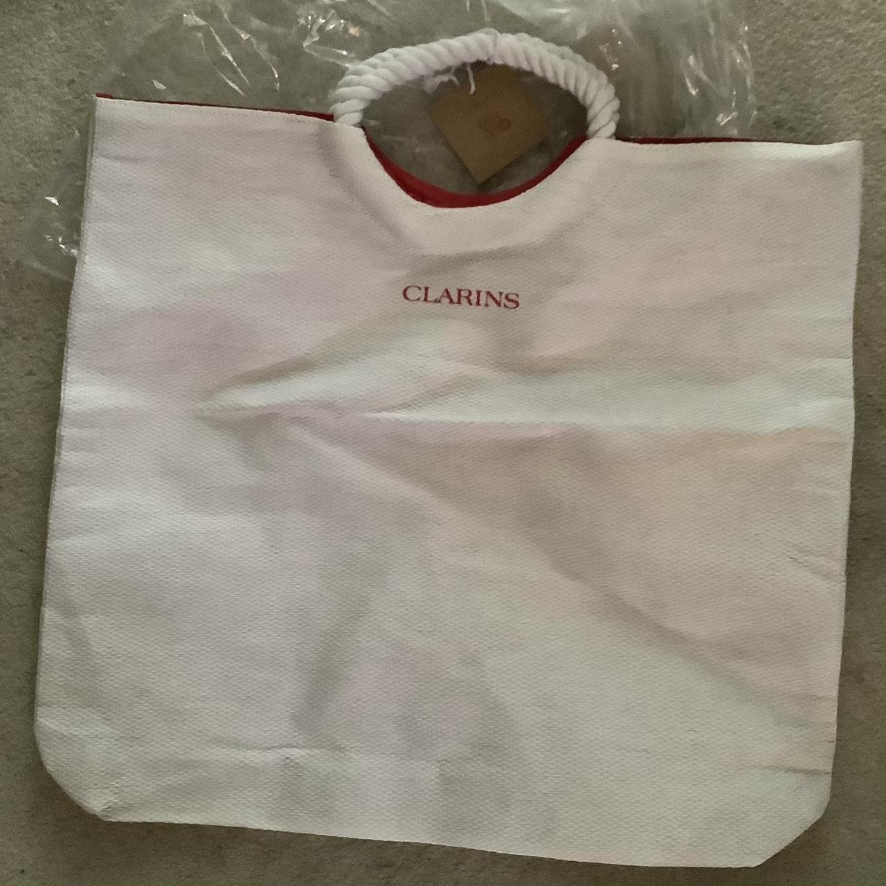 Clarins white beach bag New Free postage on bundles... - Depop