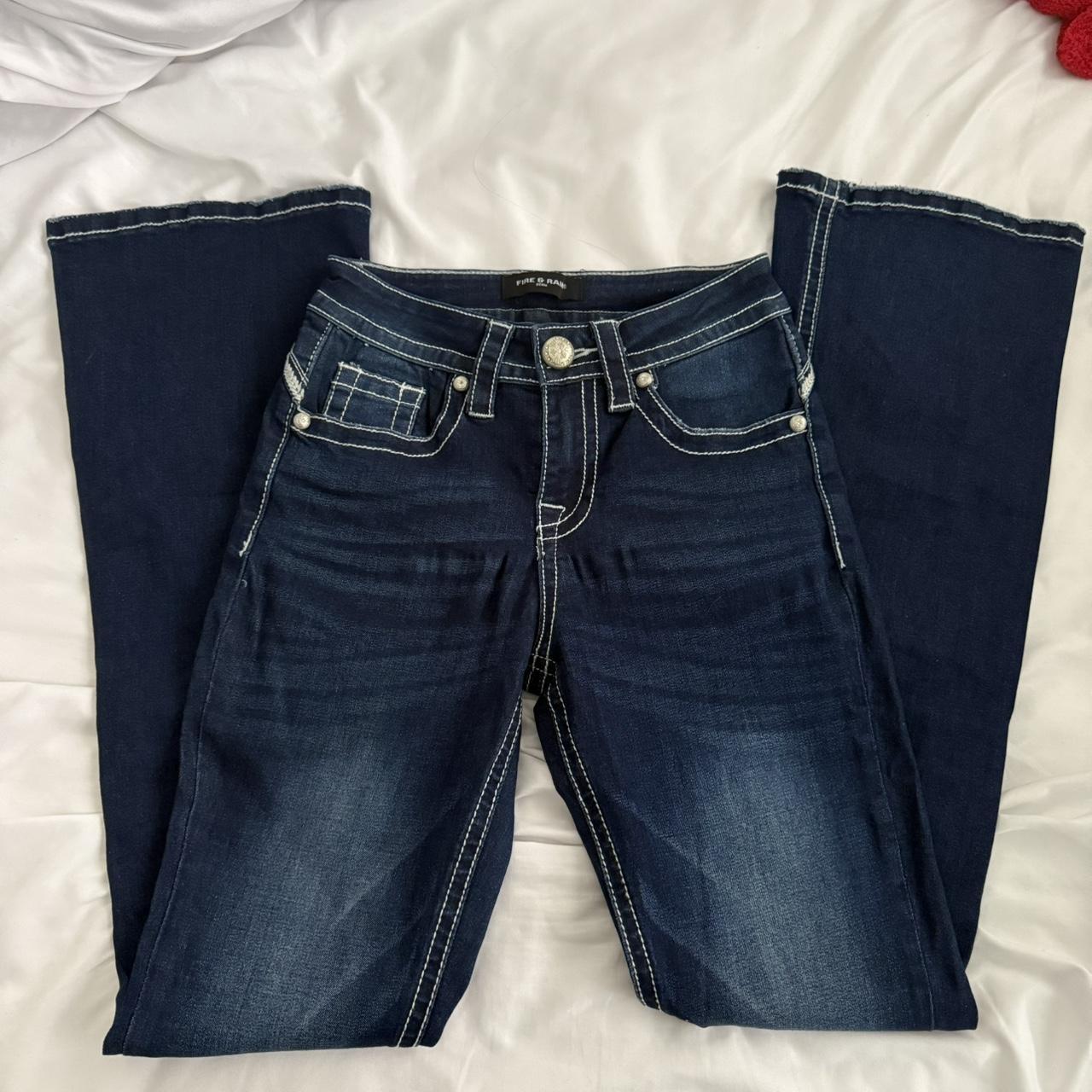 Dark wash flared jeans w/ embroidery on the back... | Depop