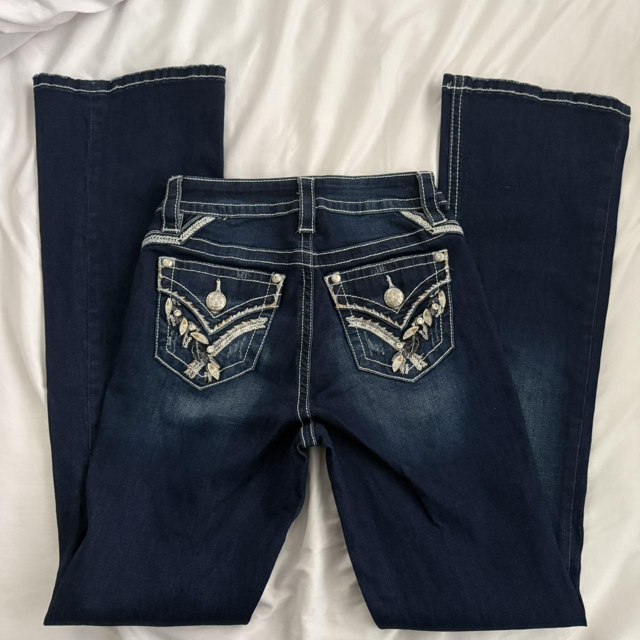 Dark wash flared jeans w/ embroidery on the back... | Depop
