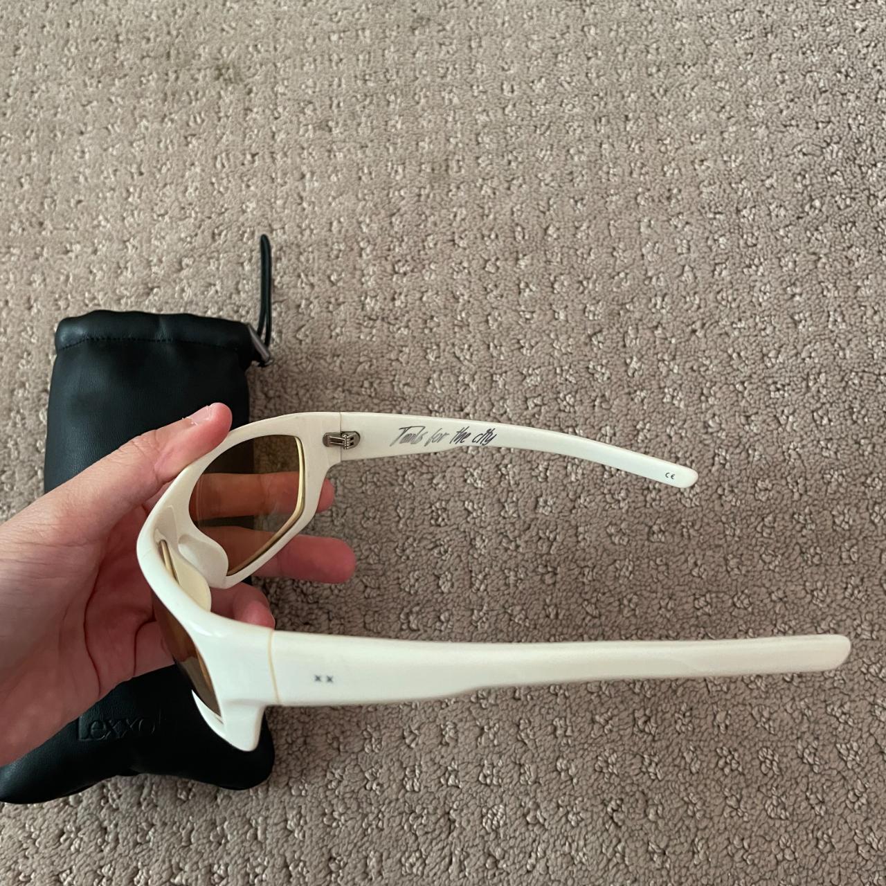 Lexxola neo/white/honey sunglasses Worn once... - Depop