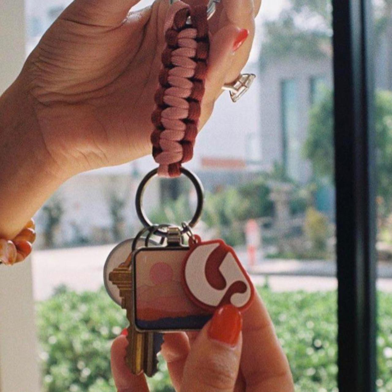 glossier desert keychain, only available in stores.... - Depop