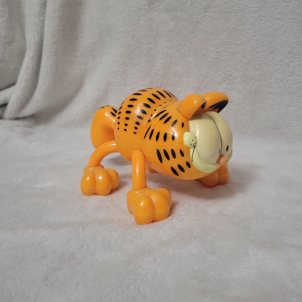 garfield massager. needs batteries, works. Auto Buy... | Depop