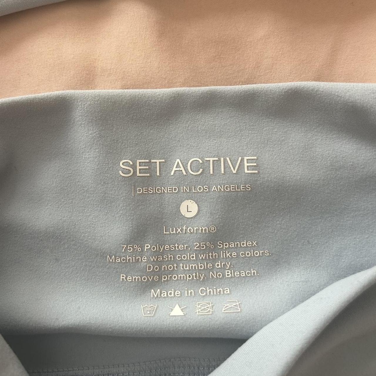 Set Active baby blue workout set Top is a Medium... - Depop