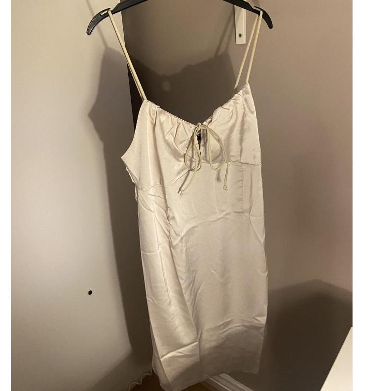 Cream / champagne colour satin dress. Stretchy back... - Depop