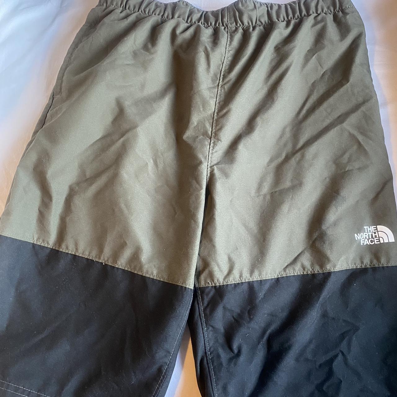 Boys north face shorts Can fit mens S Khaki black - Depop