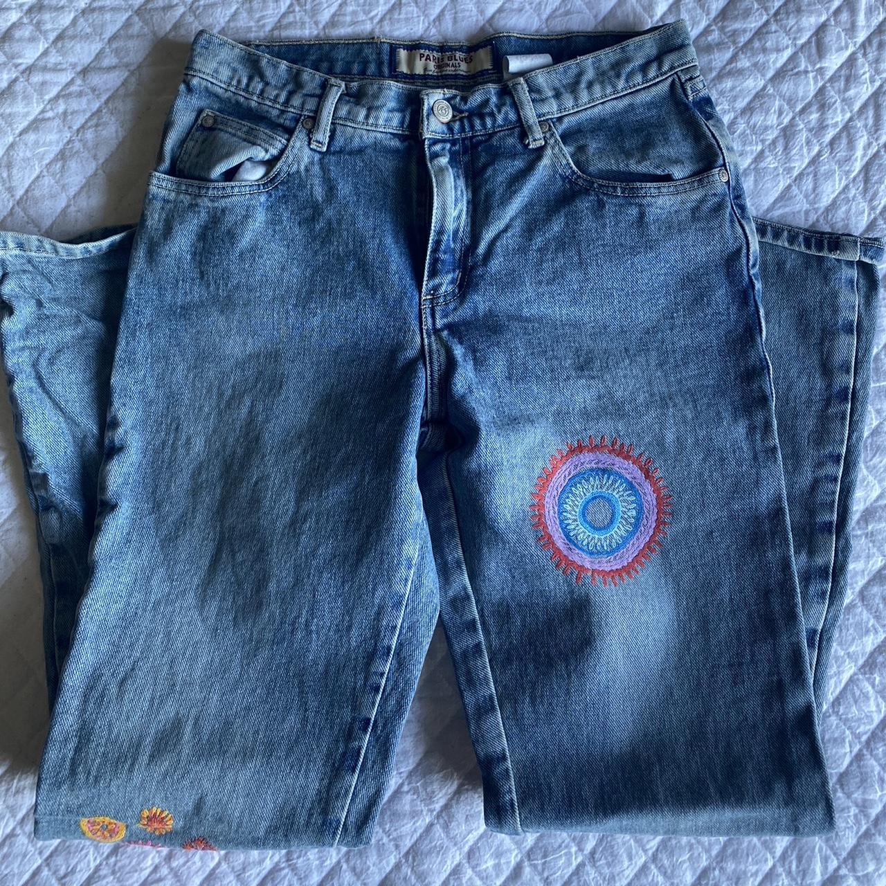 cutest pair of flare jeans with flower pattern on... - Depop