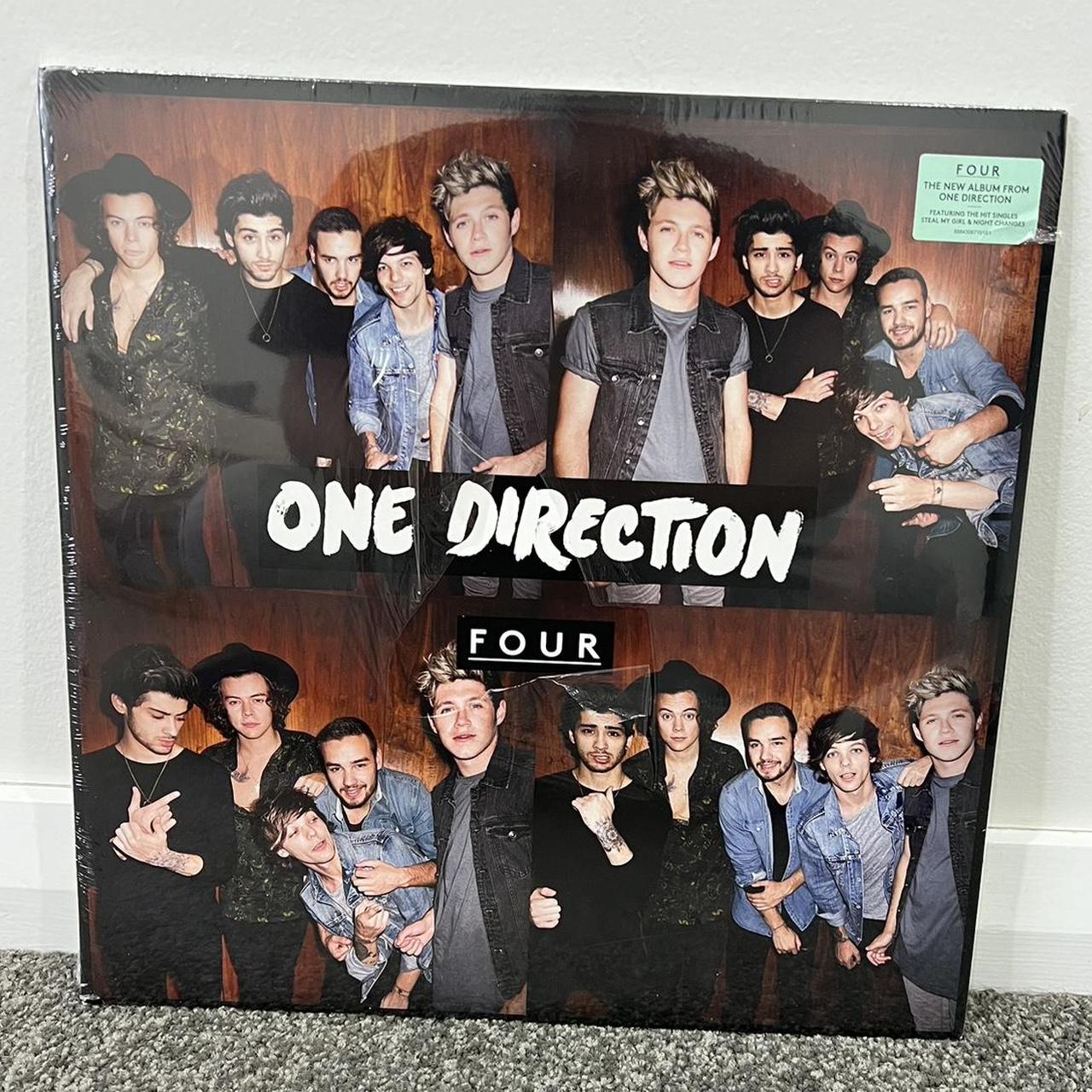 One direction four vinyl - shrink wrap ripped,... - Depop