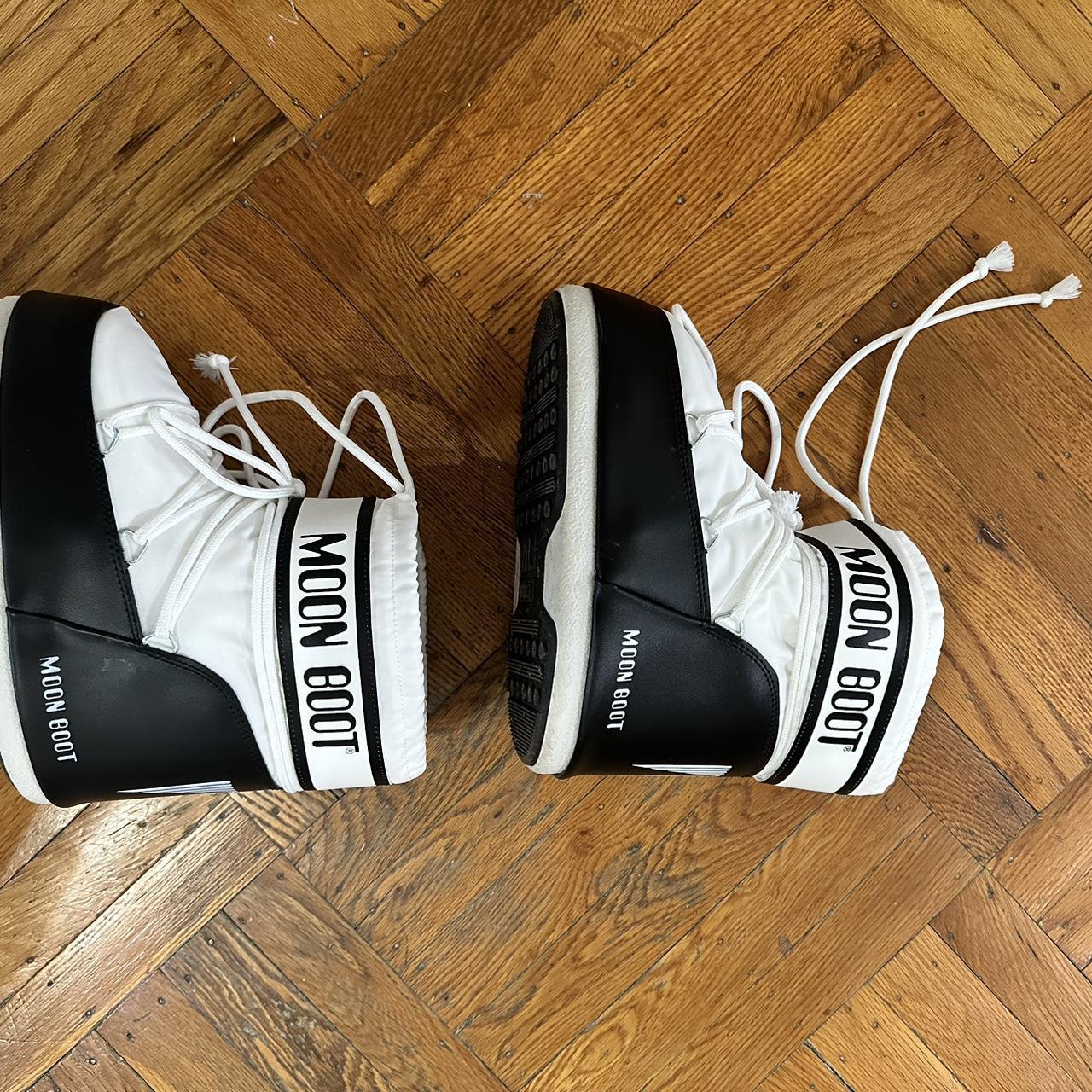 white and black moon boots; size 38 - 41 worn... - Depop