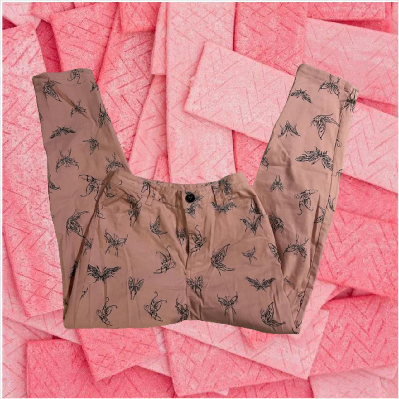 Pink patterned pants from zumiez, fits like a 25... - Depop