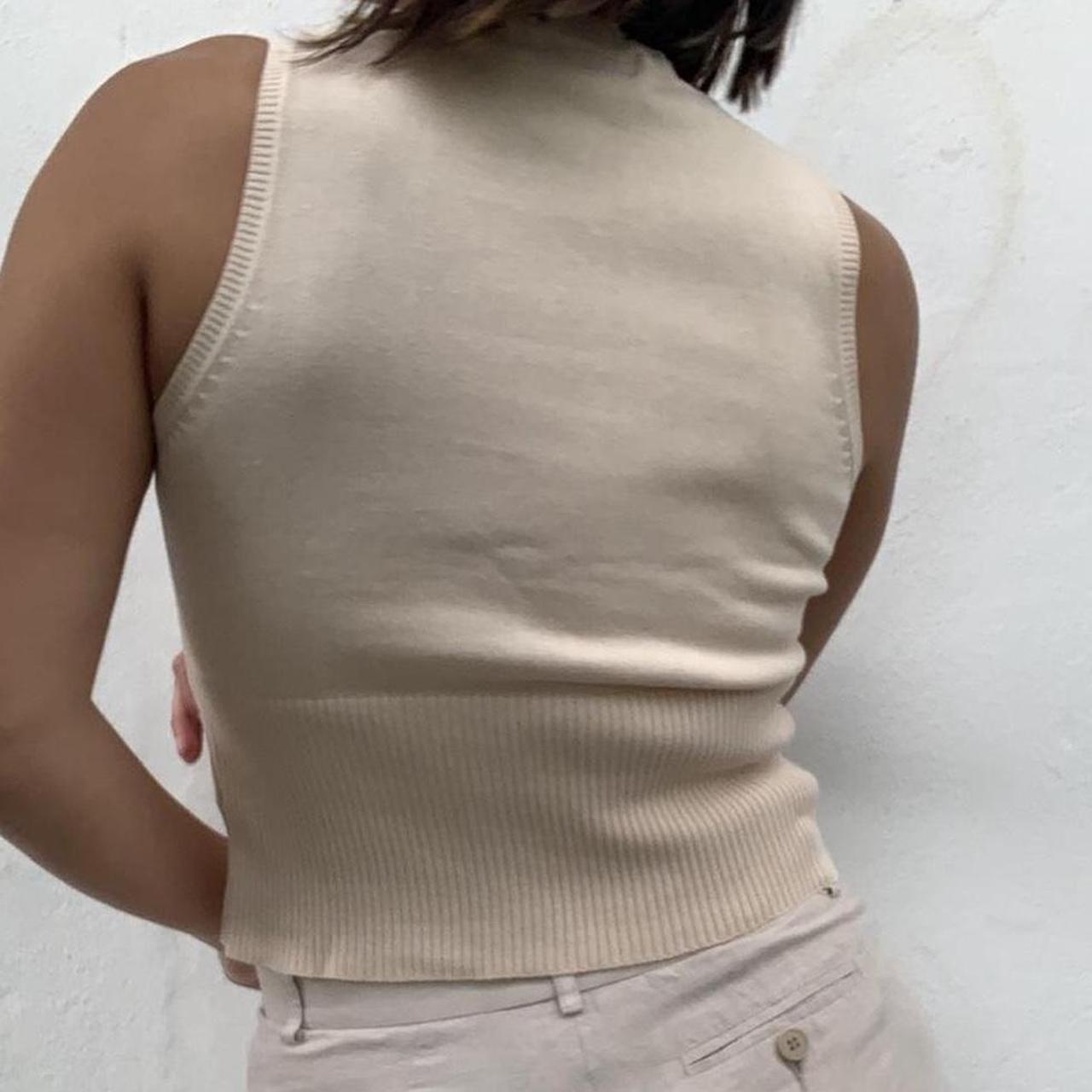 Super cute little knit vest with different coloured... - Depop