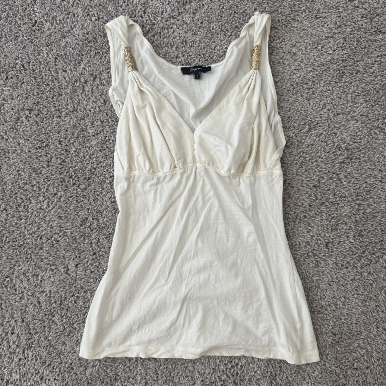 Cream Express tank top with gold detail on straps... | Depop