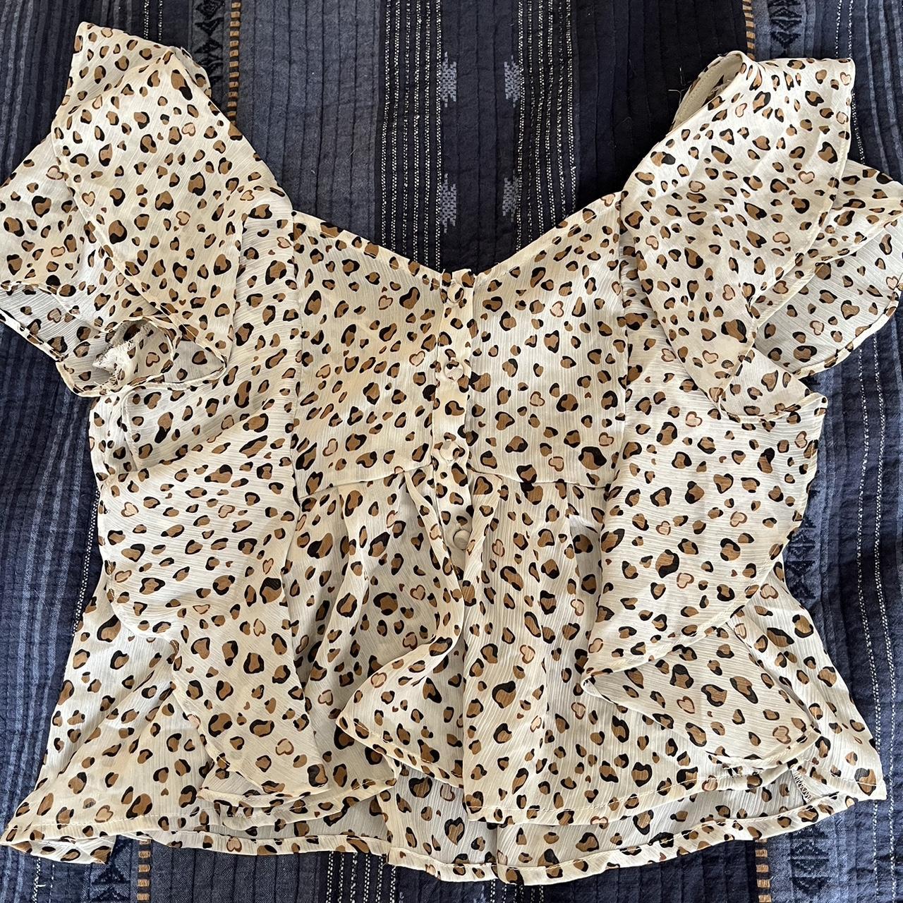 Cheetah print ruffle crop top, size XS but fits more... - Depop