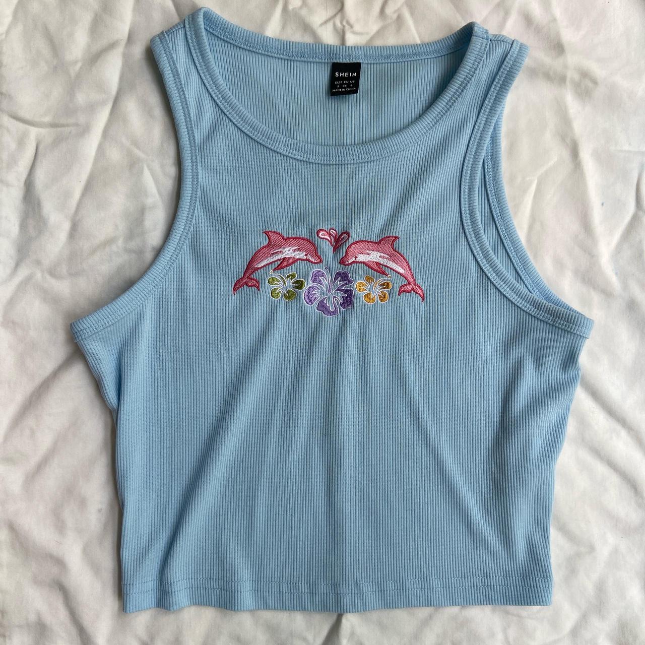 Blue ribbed tank with embroidered pink dolphins and... | Depop
