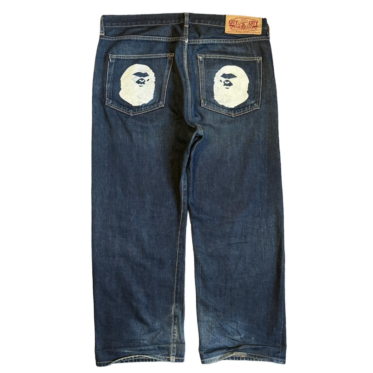 Baggy bape navy denim jeans with ape head design on... - Depop