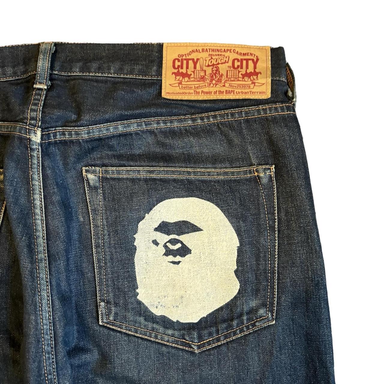 Baggy bape navy denim jeans with ape head design on... - Depop