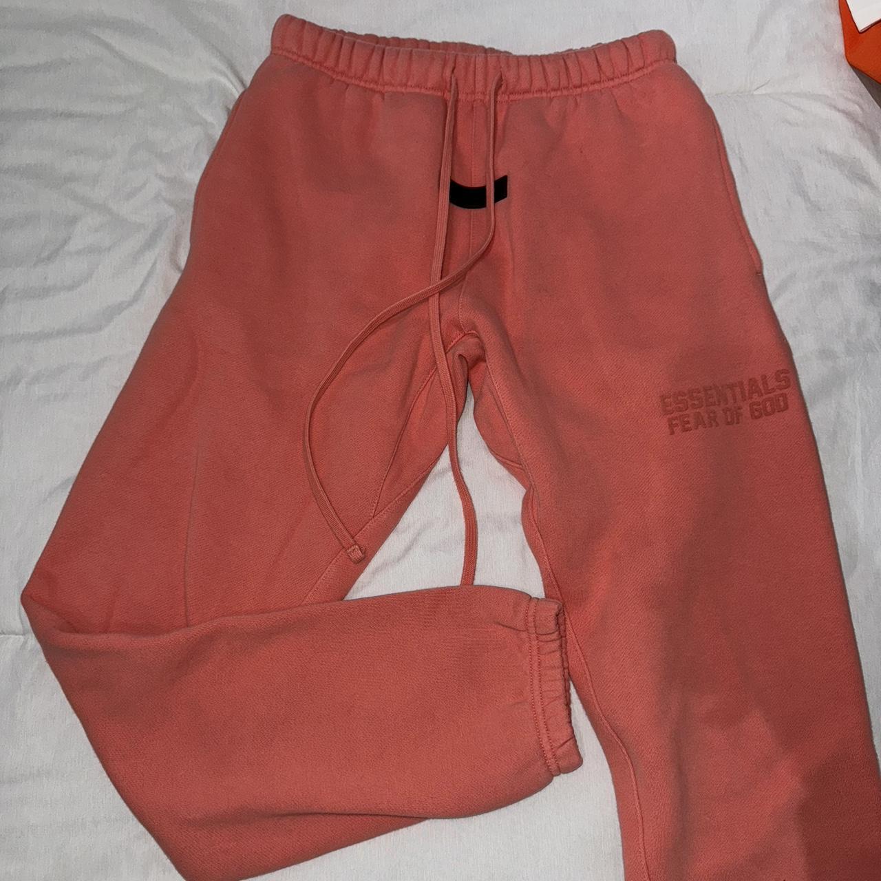 essentials “pink” sweatpants, looks more coral in... - Depop