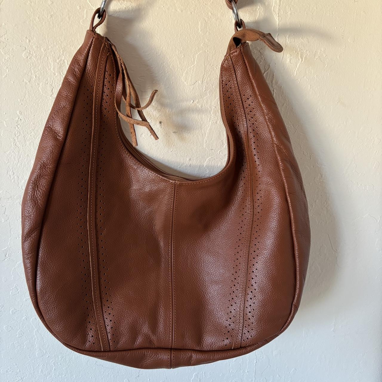 Brown crescent shaped leather purse in great... - Depop