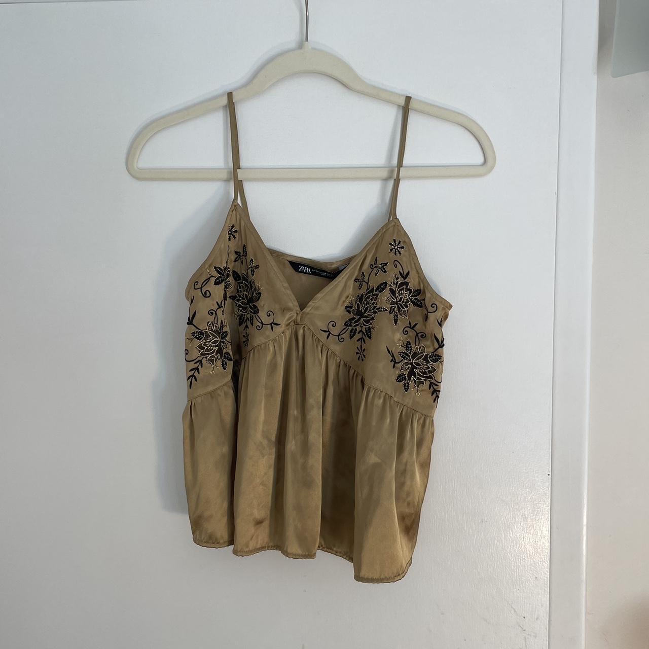 Stunning gold silky embroidered tank top. Has black... - Depop