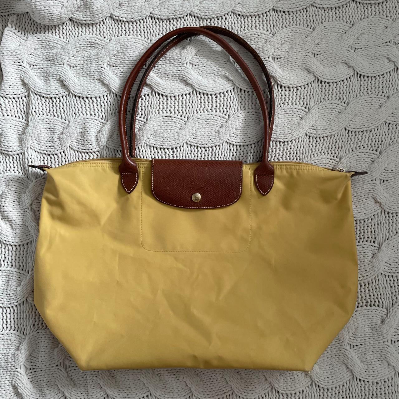 Yellow Longchamp bag, few marks on the bottom from... - Depop