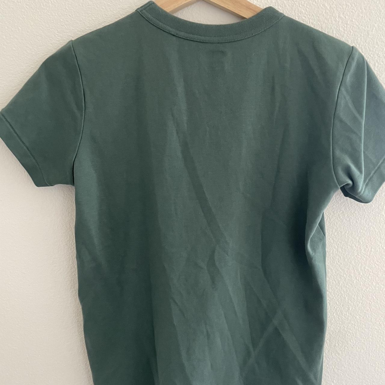 Green Uniqlo tshirt (more of a boxy cut) Size... - Depop