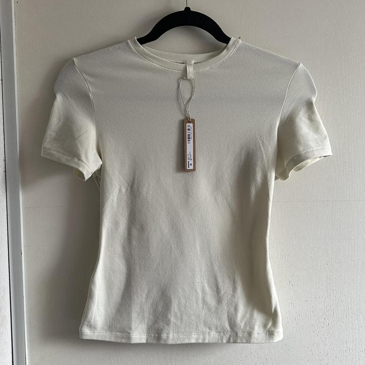 Skims Women's Cream T-shirt | Depop