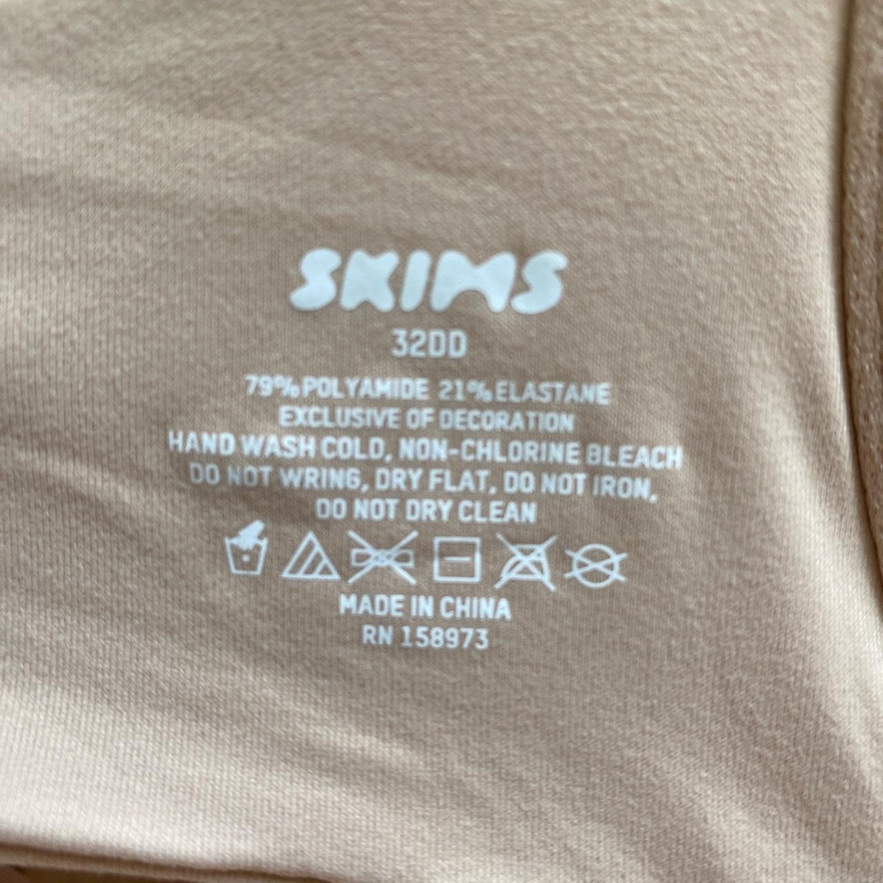 Skims Women's Cream and Tan Bra | Depop