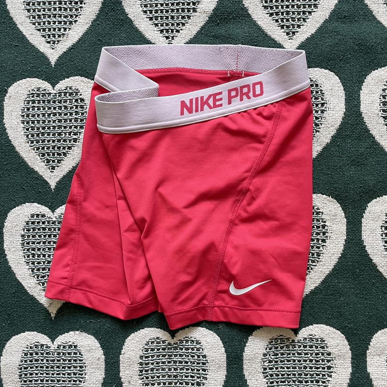 hot pink nike pro shorts