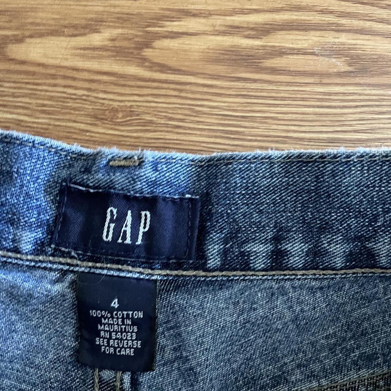 medium wash gap denim shorts in a size 4 waist:... - Depop