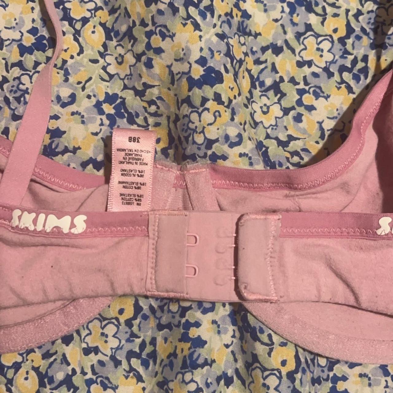 Pink Skims bra 38b a little worn - Depop