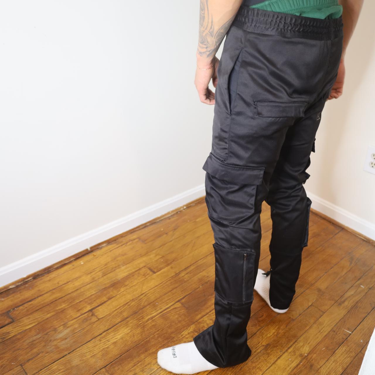 very dope black pants hella pockets model 5'9 32"... - Depop
