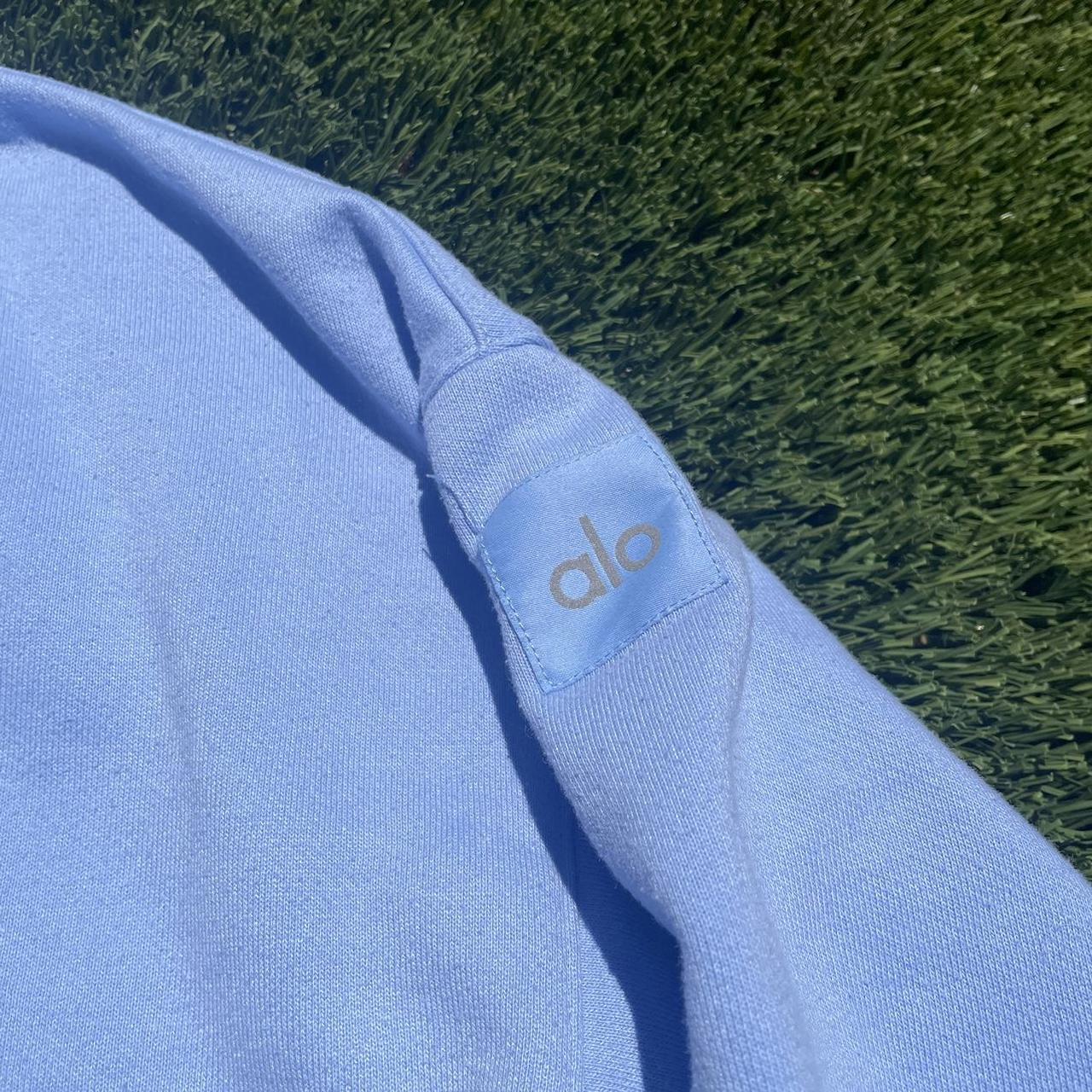 Alo Blue Sweatshirt Well worn, some pilling Size:... | Depop
