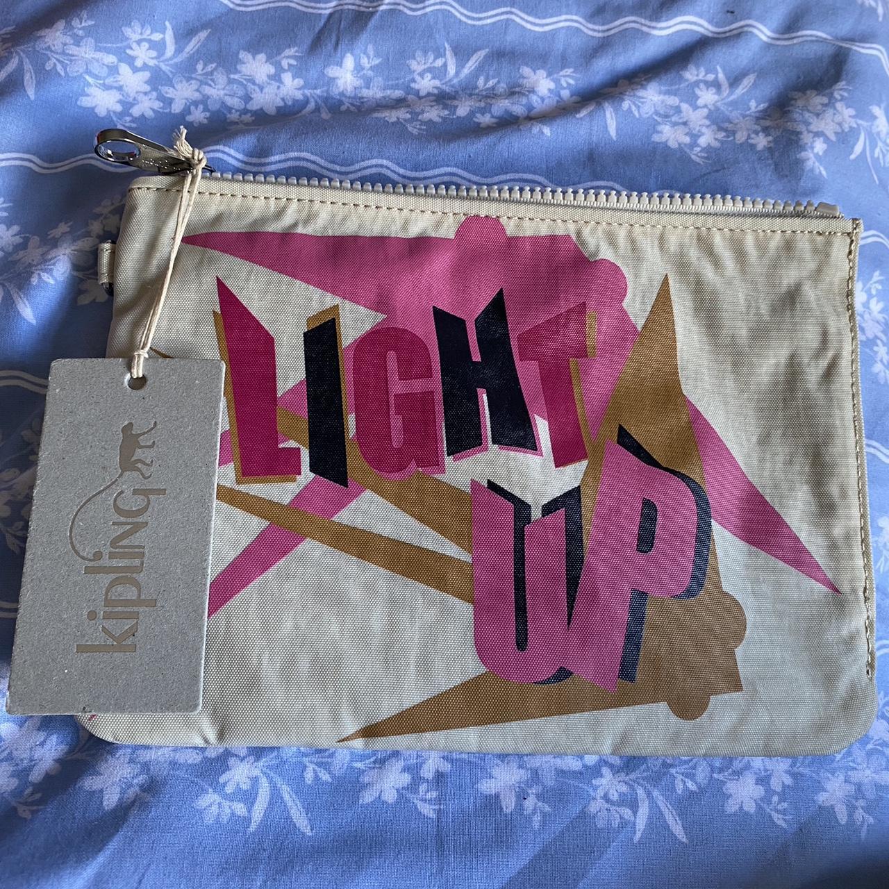 Kipling pouch with slogan “light up” wording. Item... - Depop