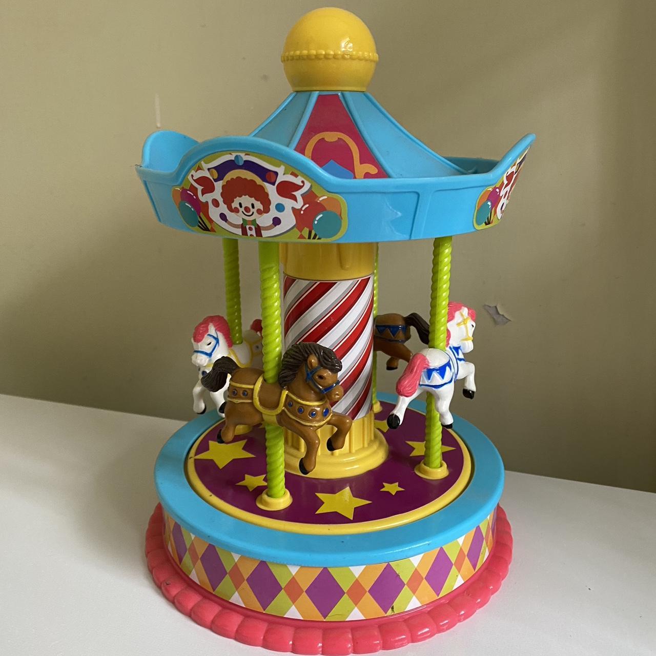 Carousel merry go round toy figurine 🎠. Brightly... - Depop