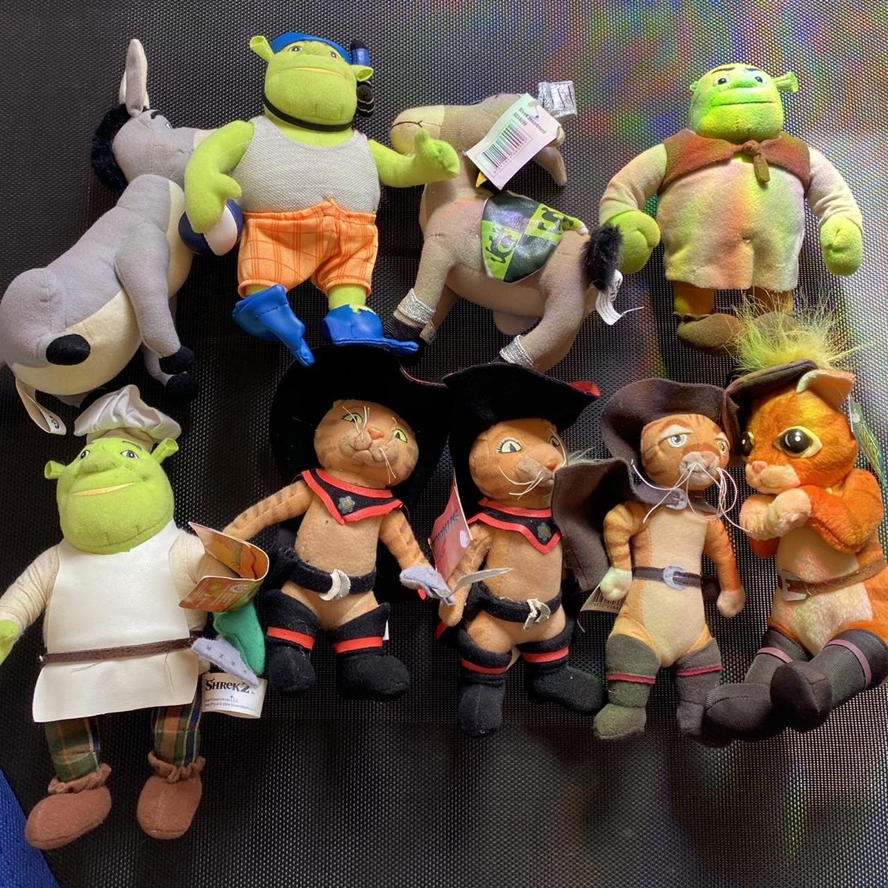 Big bundle of small shrek plushies 💚. Shrek, puss in... | Depop